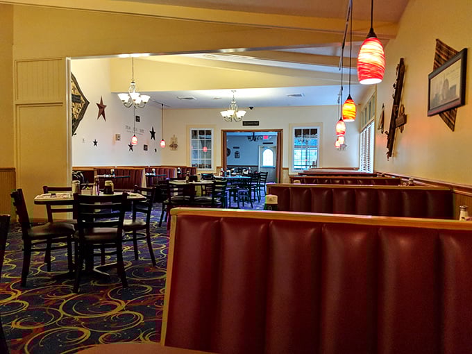 Burgundy booths and colorful pendant lights create that perfect diner atmosphere&mdash;where conversations flow as freely as the coffee refills.
