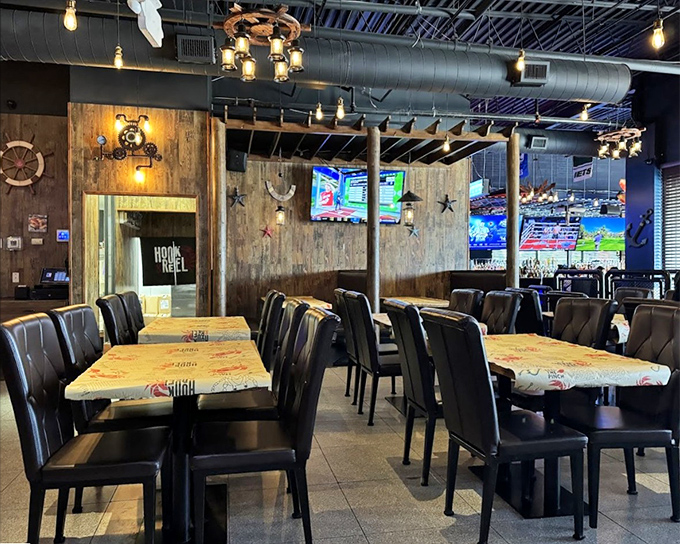 Nautical meets comfortable in this dining space where ship wheels and wooden accents create the perfect backdrop for your seafood adventure. 