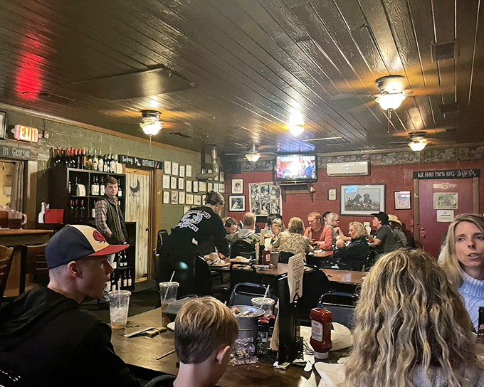 Inside, the wood-paneled walls and bustling dining room create that perfect small-town ambiance where conversations flow as freely as the sweet tea. No Instagram filters needed here&mdash;just real people enjoying real food.