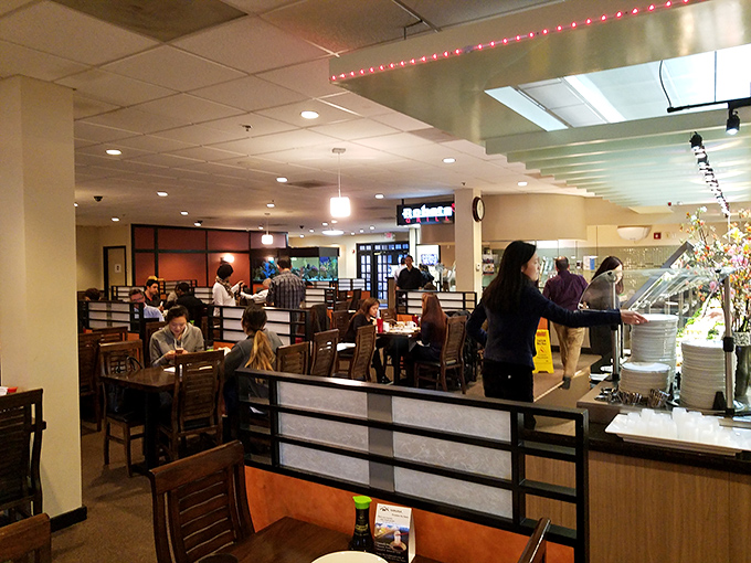 A bustling dining room where chopsticks click and conversations flow, the soundtrack to your all-you-can-eat adventure.