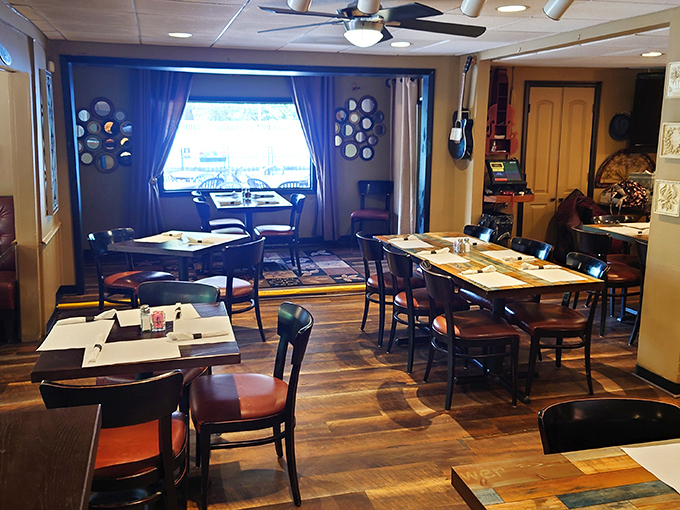 Step inside to a dining room that feels like a warm embrace&mdash;wooden tables, decorative plates, and that unmistakable neighborhood restaurant charm.