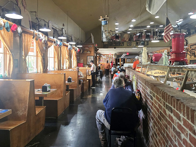 Inside, exposed brick walls and wooden floors create the perfect backdrop for the smoky magic that's about to happen on your plate.