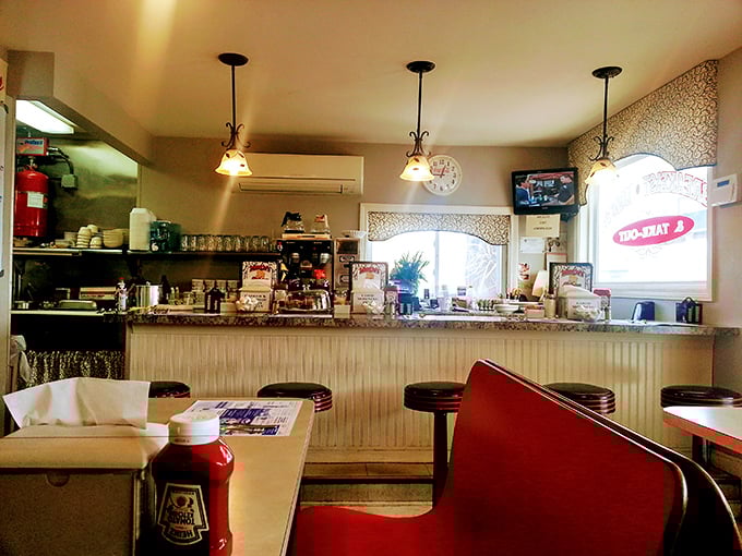 The counter with its classic stools invites you to belly up for a meal where conversations flow as freely as the coffee.