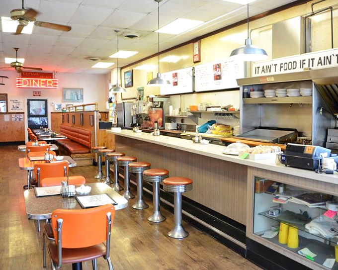 Classic Americana in every corner&mdash;chrome stools, orange chairs, and a counter where strangers become neighbors over coffee.