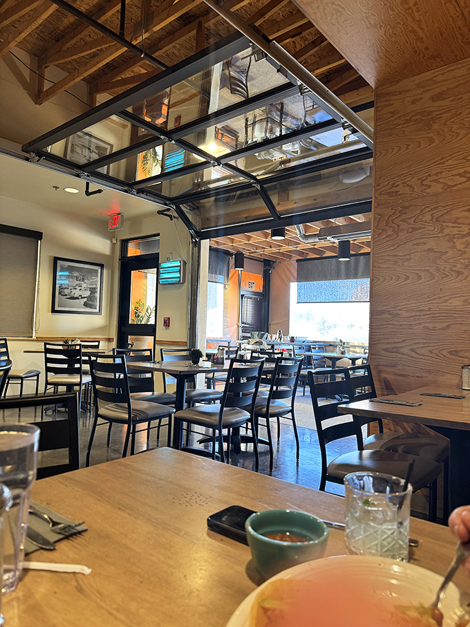 Industrial-chic meets cozy comfort with that genius garage door window. When New Mexico's perfect weather arrives, the boundary between inside and outside simply vanishes.