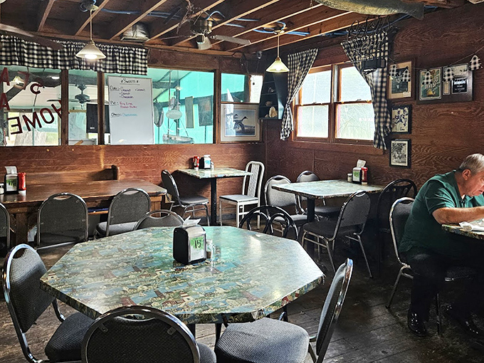 Wood-paneled walls, checkered curtains, and tables that have hosted countless conversations&mdash;this is comfort before it was trendy.