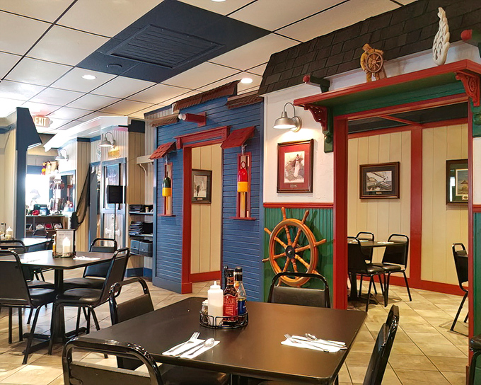 Step inside and you're transported to a whimsical maritime village, complete with colorful facades and nautical wheels that set the perfect stage for seafood indulgence.