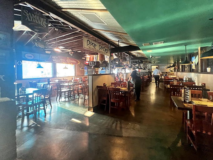 Inside, nautical charm meets laid-back Florida vibes. The green ceiling and wooden accents create that perfect "vacation mode" atmosphere locals never want to leave.