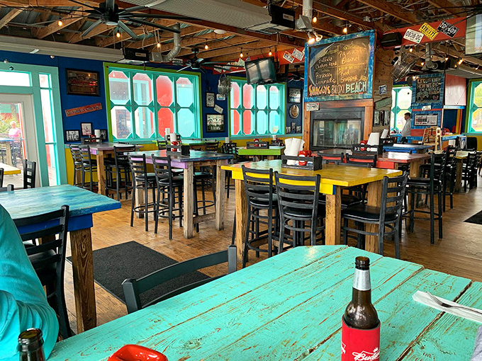 Step inside and the beach party continues with colorful tables, nautical decor, and enough coastal charm to fill the Gulf.