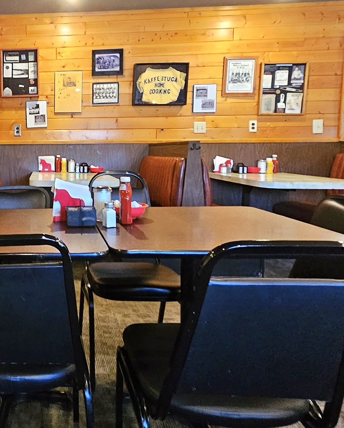 Classic diner charm with pine-paneled walls showcasing decades of local history&mdash;this is Minnesota's version of a time machine with pancakes.