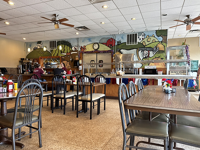 Step inside where colorful murals and comfortable booths create the perfect breakfast sanctuary.
