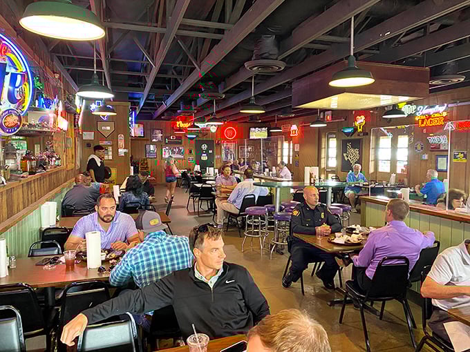 Where neon beer signs meet wood paneling and the serious business of barbecue happens. This isn't decor&mdash;it's a time capsule of Texas dining culture.