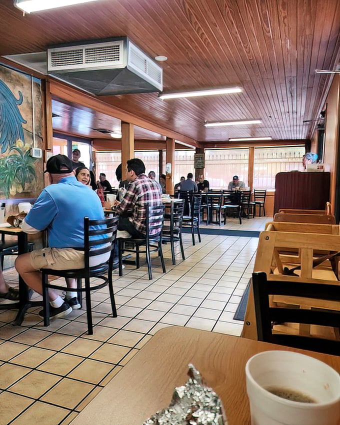 Wood-paneled ceilings, simple tables, and the buzz of conversation create that rare atmosphere where food, not ambiance, is the undisputed star.