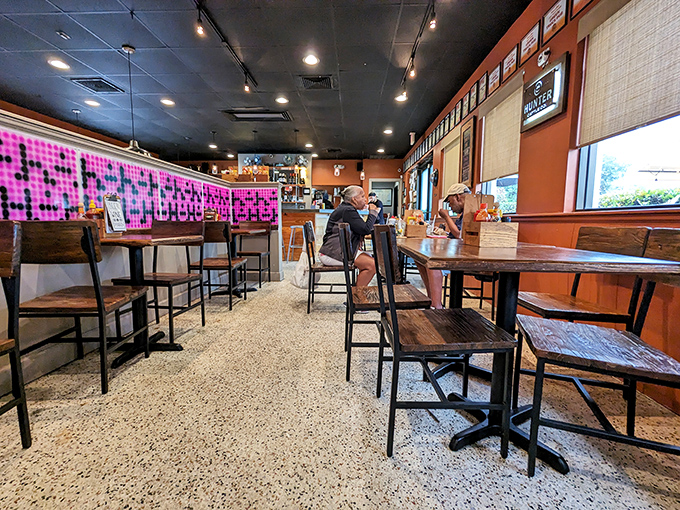 Warm wood, polished concrete, and that unmistakable neighborhood vibe&mdash;this is where burger dreams are born.