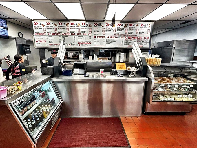 Behind the gleaming stainless steel counter, culinary magic happens. This no-frills setup has launched thousands of beef-induced food comas.