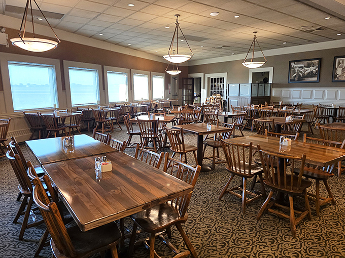 Wooden tables and Windsor chairs create that perfect "grandma's dining room but bigger" atmosphere where comfort food meets comfortable seating.