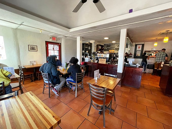 Warm terra cotta floors and cheerful atmosphere create the perfect backdrop for culinary magic.