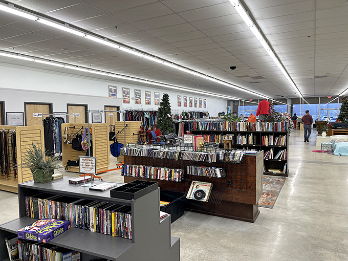 Books, media, and clothing stretch as far as the eye can see. It's like someone organized your eccentric aunt's attic collection&mdash;but with better lighting.