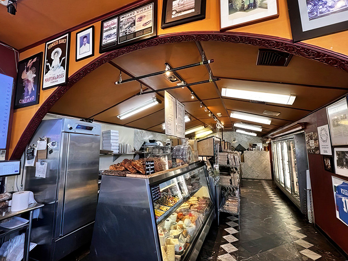 Step right into this orange-hued wonderland where photos watch over your meal like proud Italian relatives.