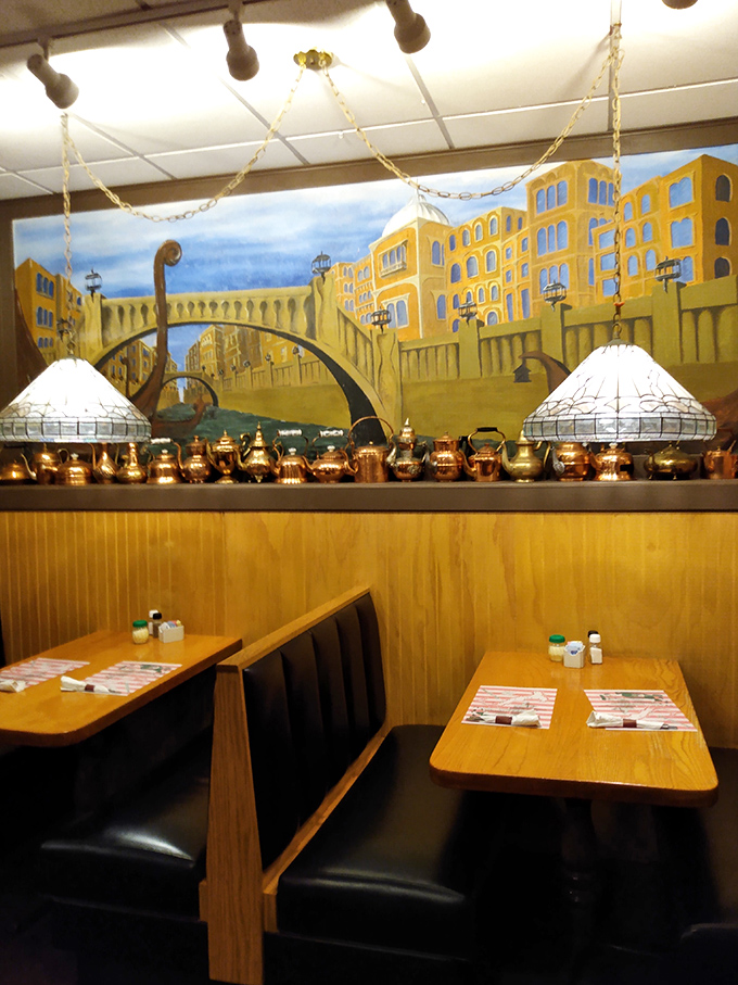 Italian dreamscapes painted on the walls transport diners straight to Venice. Those copper kettles aren't just decoration&mdash;they're storytellers of meals past.