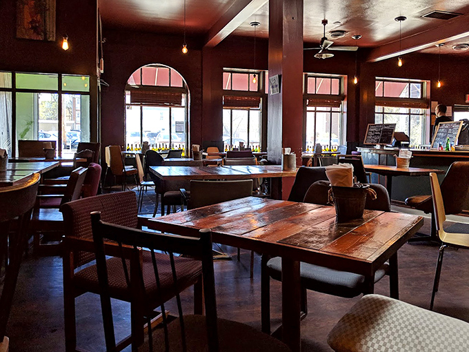 Warm wooden tables, pendant lighting, and that rich ceiling create the perfect backdrop for life-changing carb experiences. It's like dining in a European bistro without the jet lag.