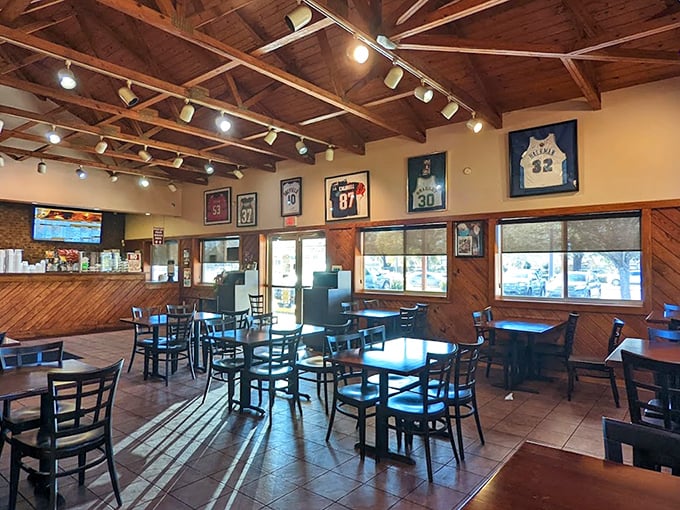 Where sports memorabilia meets smoke-infused wood paneling. The dining room feels like your favorite uncle's den, if your uncle happened to be a BBQ genius.