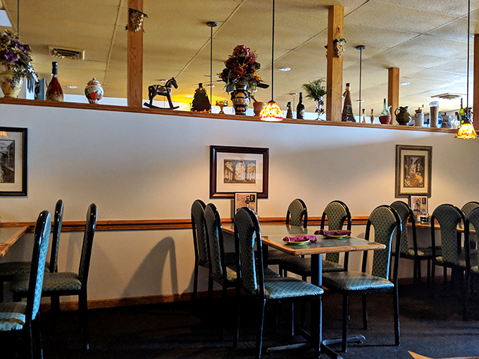 Cozy charm defines the dining room, where decorative bottles and knickknacks line the shelves like Italian grandmothers' treasured mementos.