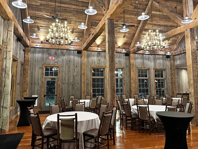 Rustic elegance defined: massive timber beams meet crystal chandeliers in a dining room that feels like a millionaire's cabin. Comfort and sophistication sharing the same dance floor.