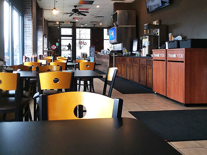 Inside, function trumps fashion with simple wooden chairs and tiled floors. The real decoration? That intoxicating aroma of smoked meat that hits you like a welcome hug.