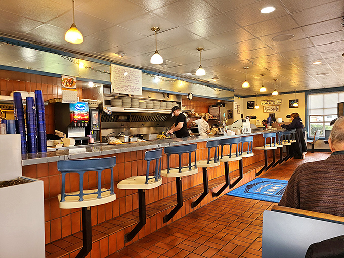 Counter seating puts you front-row for the breakfast ballet. Watch skilled cooks transform simple ingredients into plates of joy while you sip that essential first coffee.