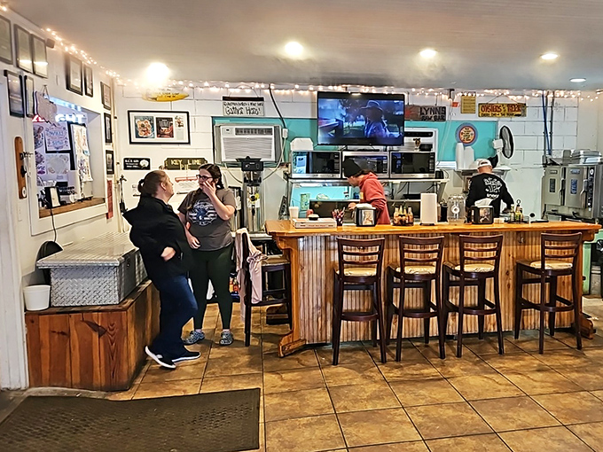Where magic happens: The corrugated bar front might not win design awards, but the seafood sorcery behind it creates lifelong devotees.
