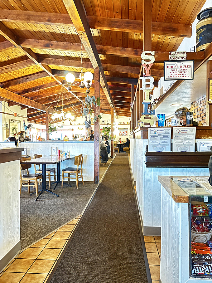 Wooden beams and that iconic "SYBIL'S" sign hanging from the ceiling&mdash;breakfast ambiance doesn't get more perfect than this.
