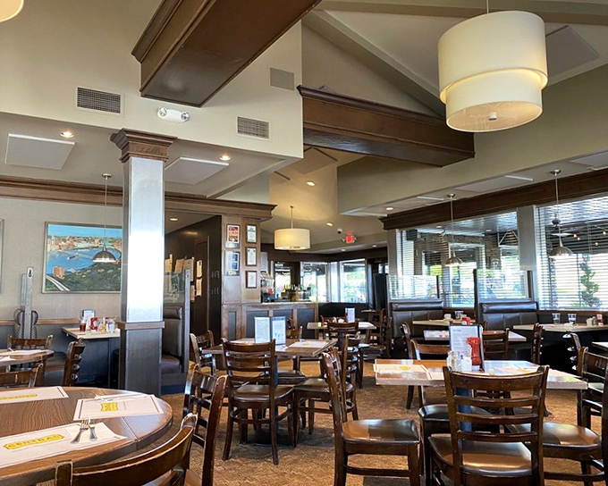 Warm wood tones and comfortable seating create that perfect "stay awhile" atmosphere—like your favorite aunt's living room, if she could cook like a dream.