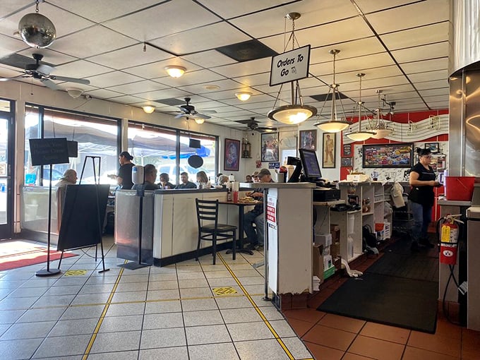 Classic diner ambiance with a side of nostalgia &ndash; ceiling fans lazily spinning above booths where countless Fresno stories have unfolded over coffee refills.