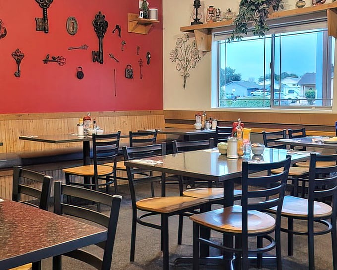 Wooden wainscoting meets vintage key decor&mdash;this dining room feels like the living room of that cool aunt who always feeds you too well.