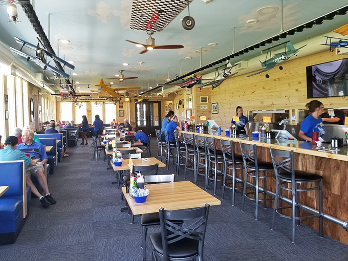 Model planes suspended from sky-blue ceilings create the perfect aviation-themed backdrop for your breakfast adventures. Eat with your head in the clouds!