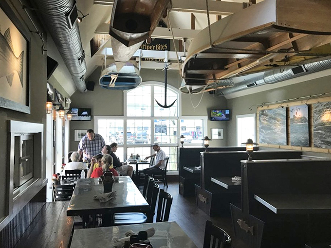 Boats suspended from the ceiling aren't just decor&mdash;they're a promise that what's on your plate was swimming not long ago. Maritime magic meets dining delight.