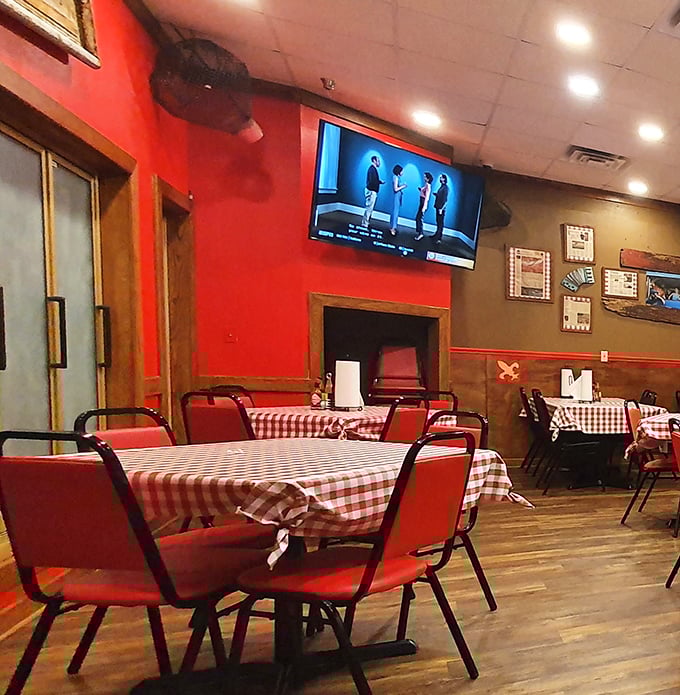 Red chairs and checkered tablecloths create that perfect "come as you are" atmosphere where memorable meals and conversations naturally unfold.