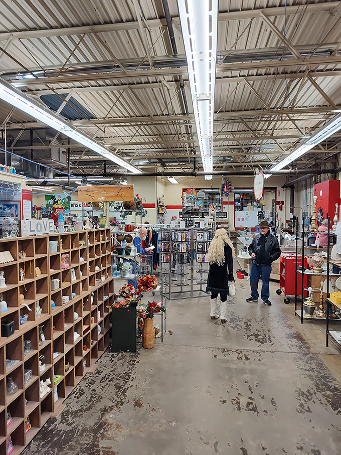 Treasure hunters navigate a labyrinth of possibility, where every aisle promises discovery and every shelf holds someone else's once-cherished belongings.
