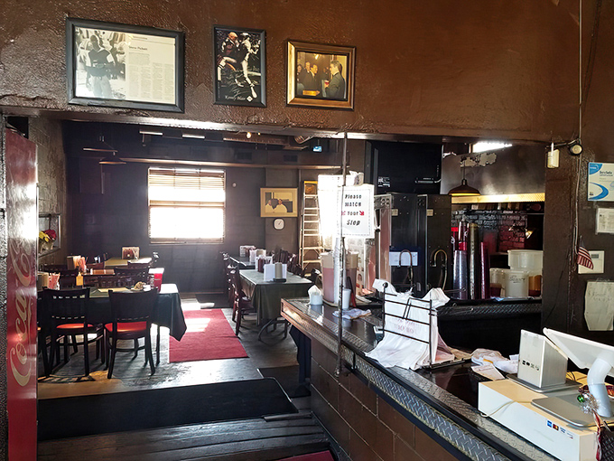 Step inside where wood paneling and vintage charm create the perfect barbecue joint atmosphere.