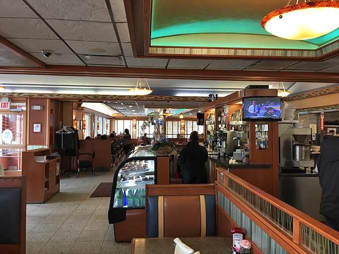 Where breakfast dreams come true. The warm wood tones and gentle lighting create that perfect diner atmosphere where everyone feels like a regular.