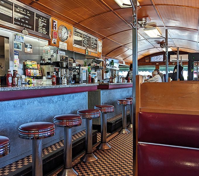 Classic diner perfection: where chrome meets comfort and every swivel stool has a story to tell. 