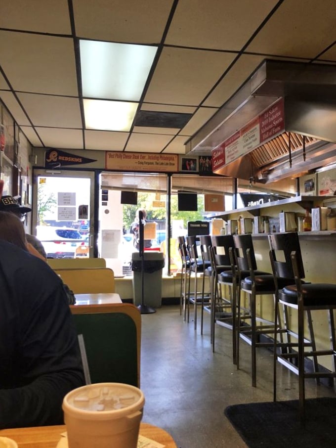 Classic counter seating where strangers become friends over coffee. In the diner universe, these stools have witnessed more honest conversations than most therapists' couches.
