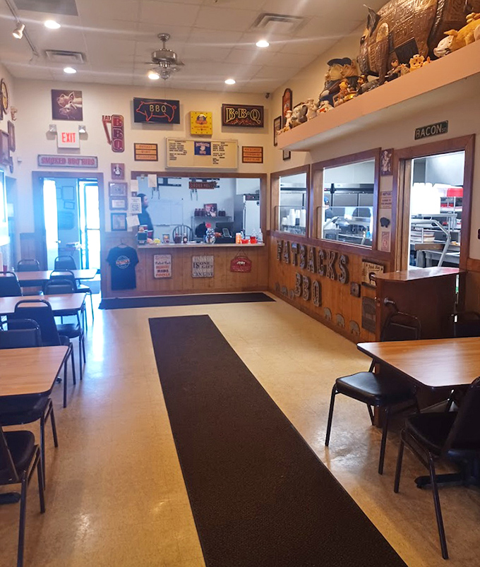 No-frills interior with a black runner carpet that might as well be labeled "Path to Deliciousness." Simple tables, extraordinary food.