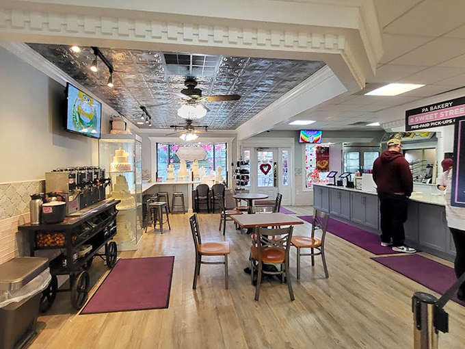 Step inside and the world slows down. This isn't just a bakery—it's a community living room where calories don't count and conversations flow freely.