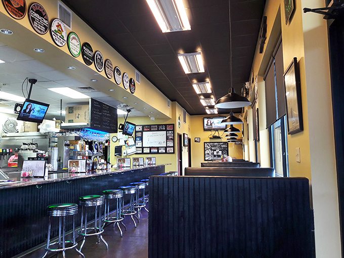 Classic diner aesthetics meet Southern charm with chrome counter stools and cozy booths&mdash;where strangers become friends over plates of comfort food.