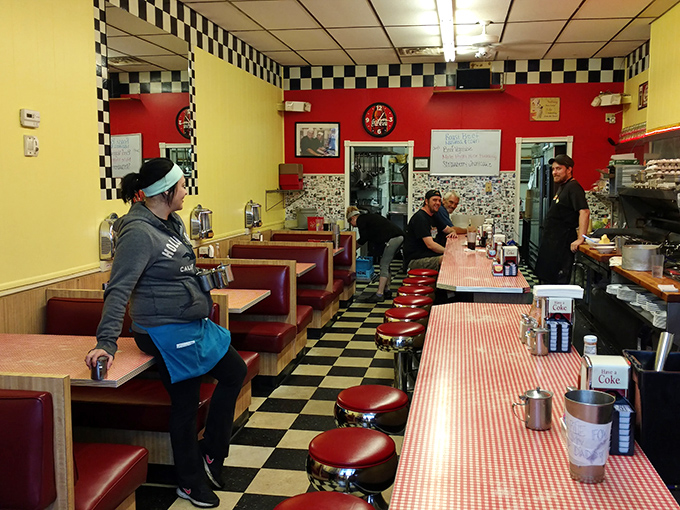Red vinyl booths, checkered borders, and counter seating&mdash;this isn't retro-themed, folks, it's the genuine article preserved in time.