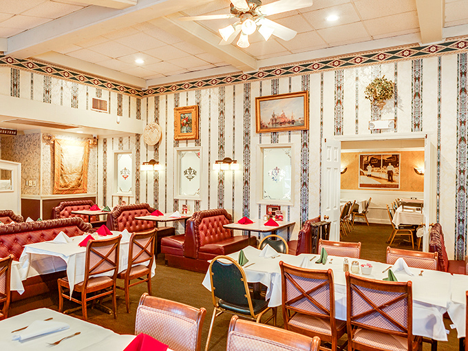 Red leather booths and striped wallpaper create that classic Italian-American restaurant vibe&mdash;where memories are made between bites of pasta.