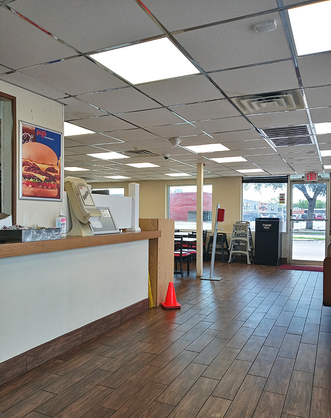 No-frills interior where culinary magic happens. Like your grandparents' rec room, if your grandparents were burger wizards with a loyal following.