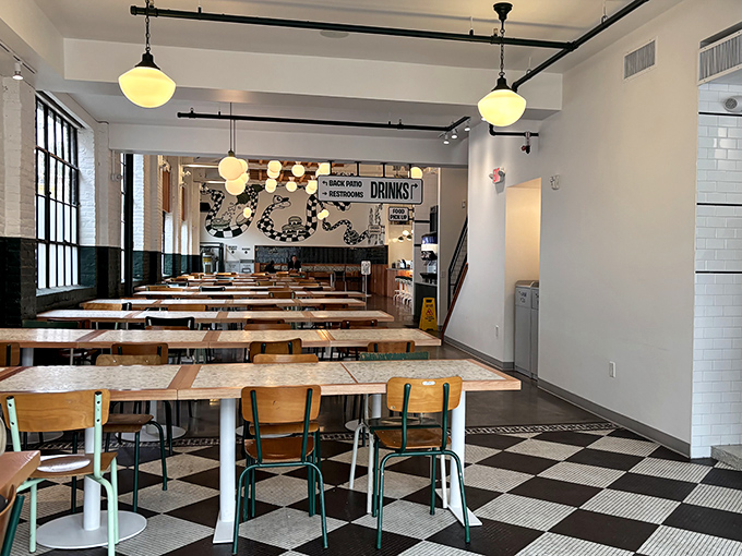 School chairs and checkered floors create that perfect "fancy-casual" vibe where you can moan about your food without judgment from neighboring tables.